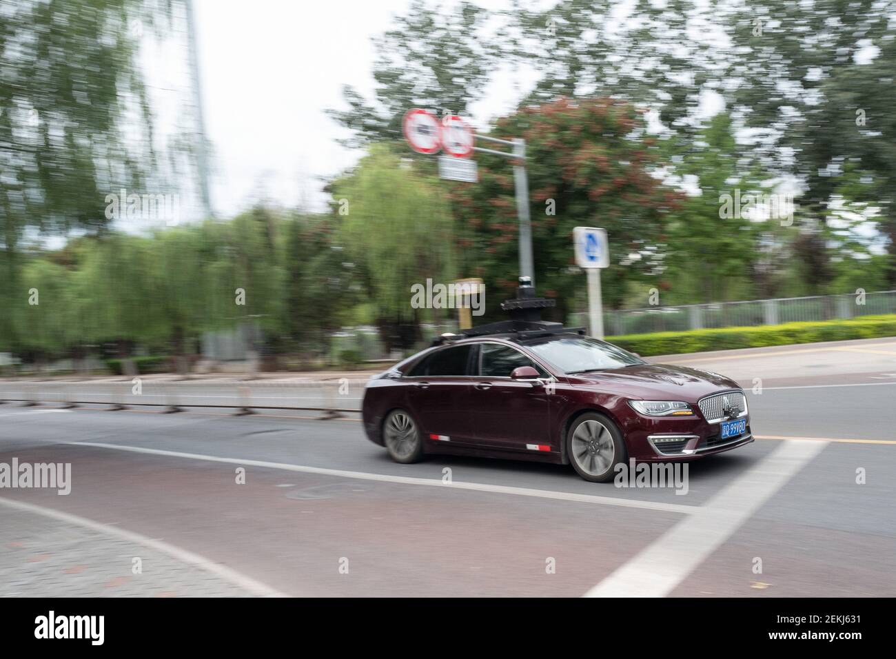 An Apollo Go Robotaxi drives on a road in Beijing, China, 10 September 2020. (Photo by Niu ...