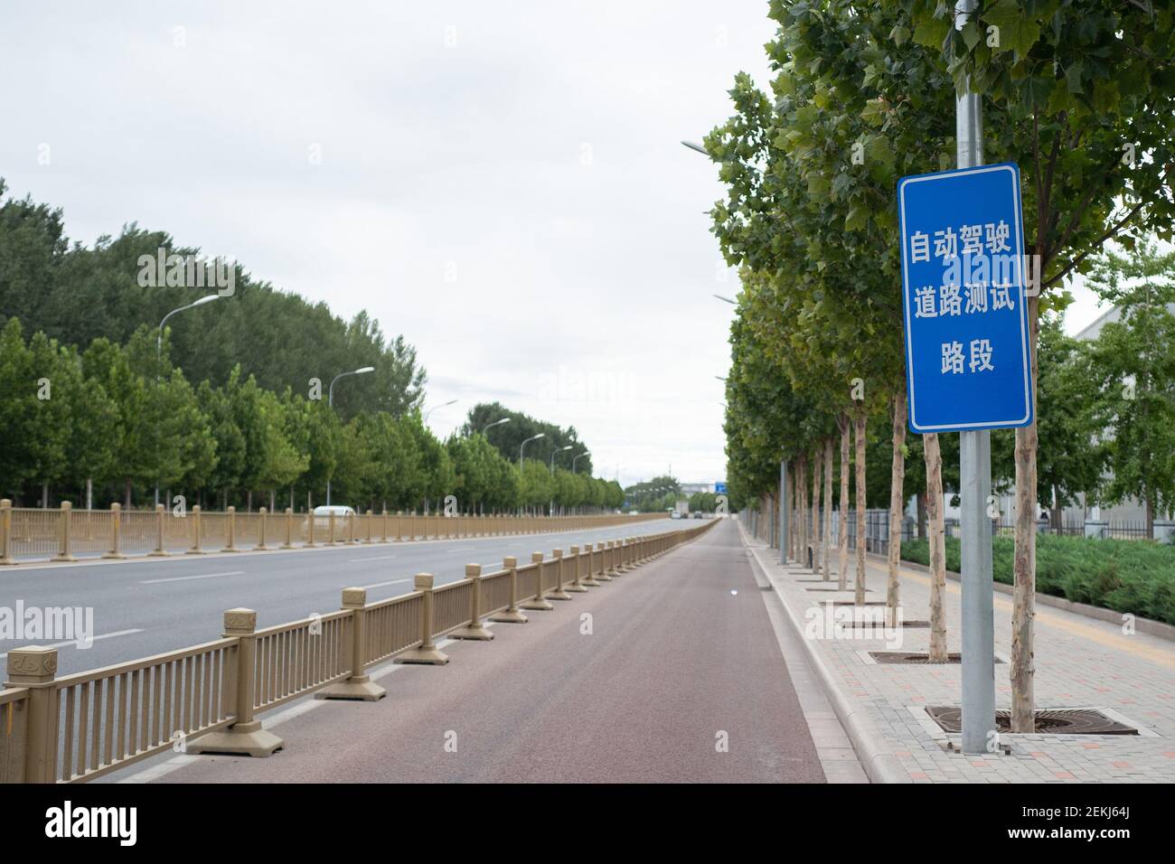 An Apollo Go Robotaxi drives on a road in Beijing, China, 10 September 2020. (Photo by Niu ...