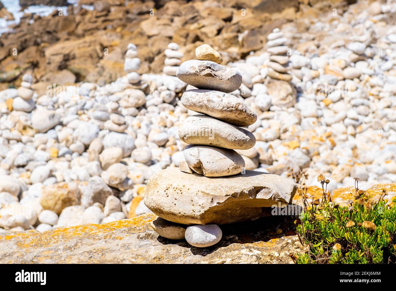 Rock cairns at Papoa Peniche, Miradouro com Vistas, Leiria District ...