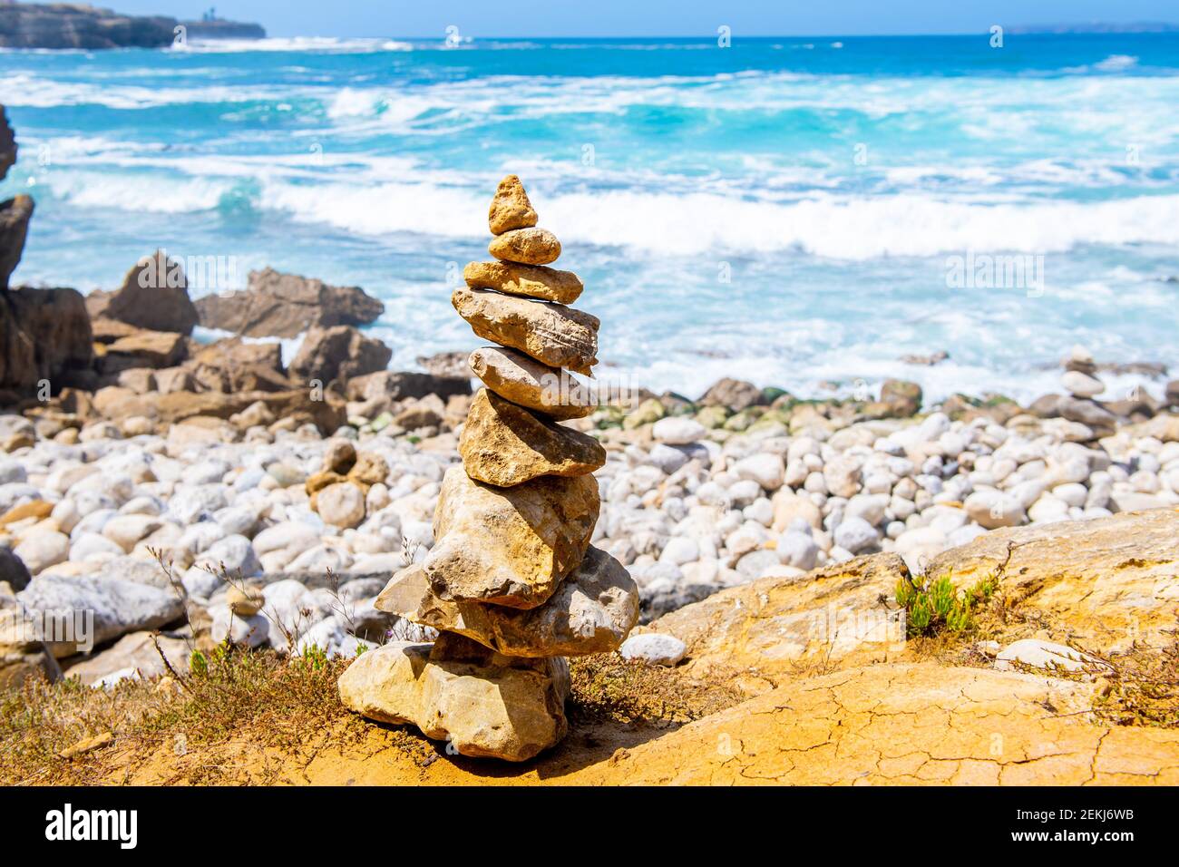 Rock cairns at Papoa Peniche, Miradouro com Vistas, Leiria District ...