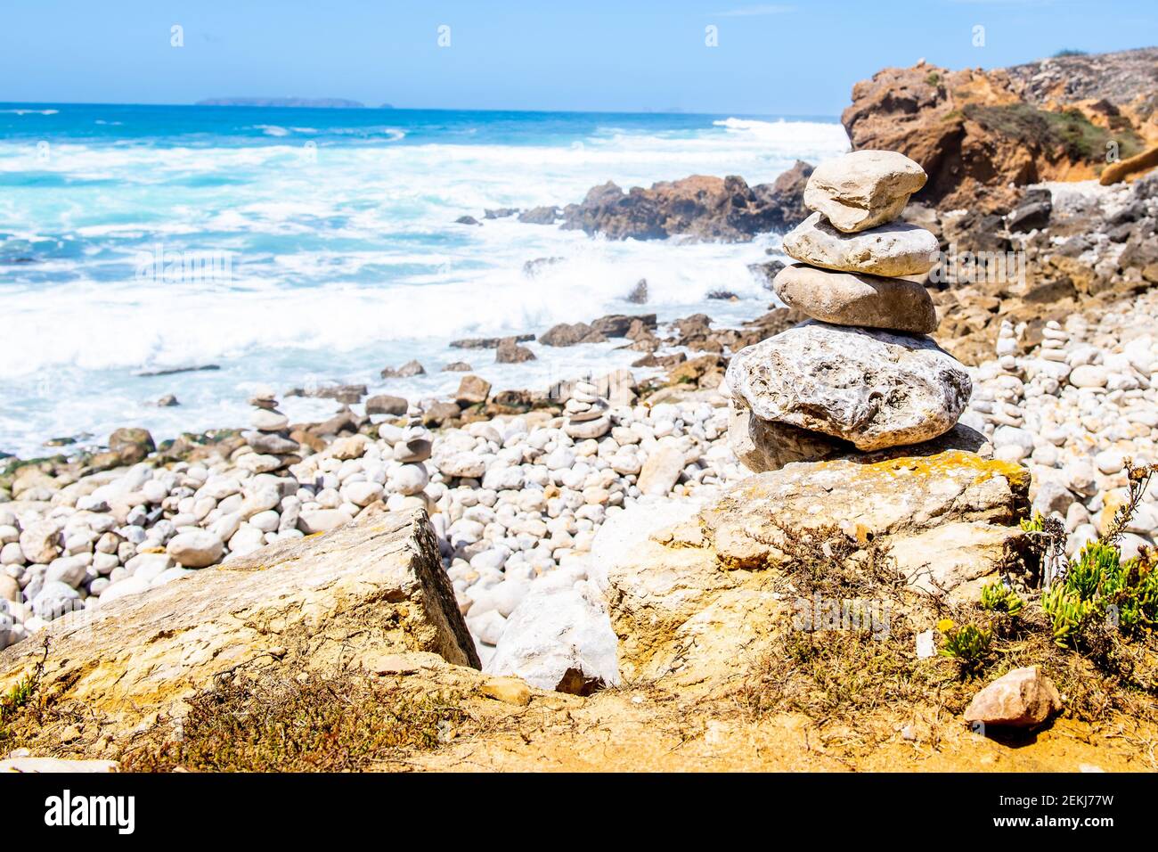 Rock cairns at Papoa Peniche, Miradouro com Vistas, Leiria District ...