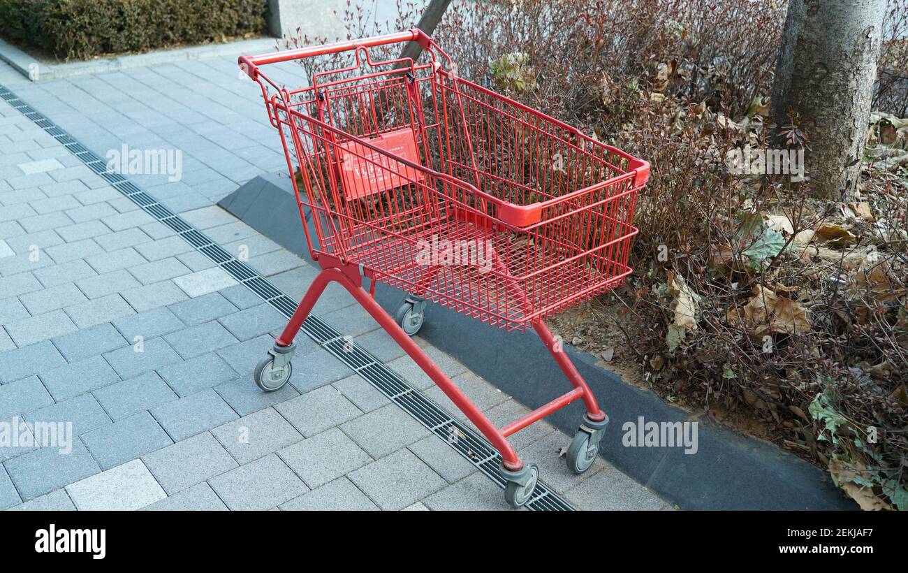 Shopping mall carts on the road Stock Photo - Alamy