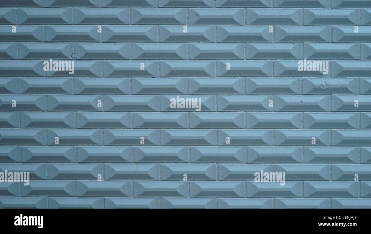 Brick wall with grooves at both ends Stock Photo - Alamy
