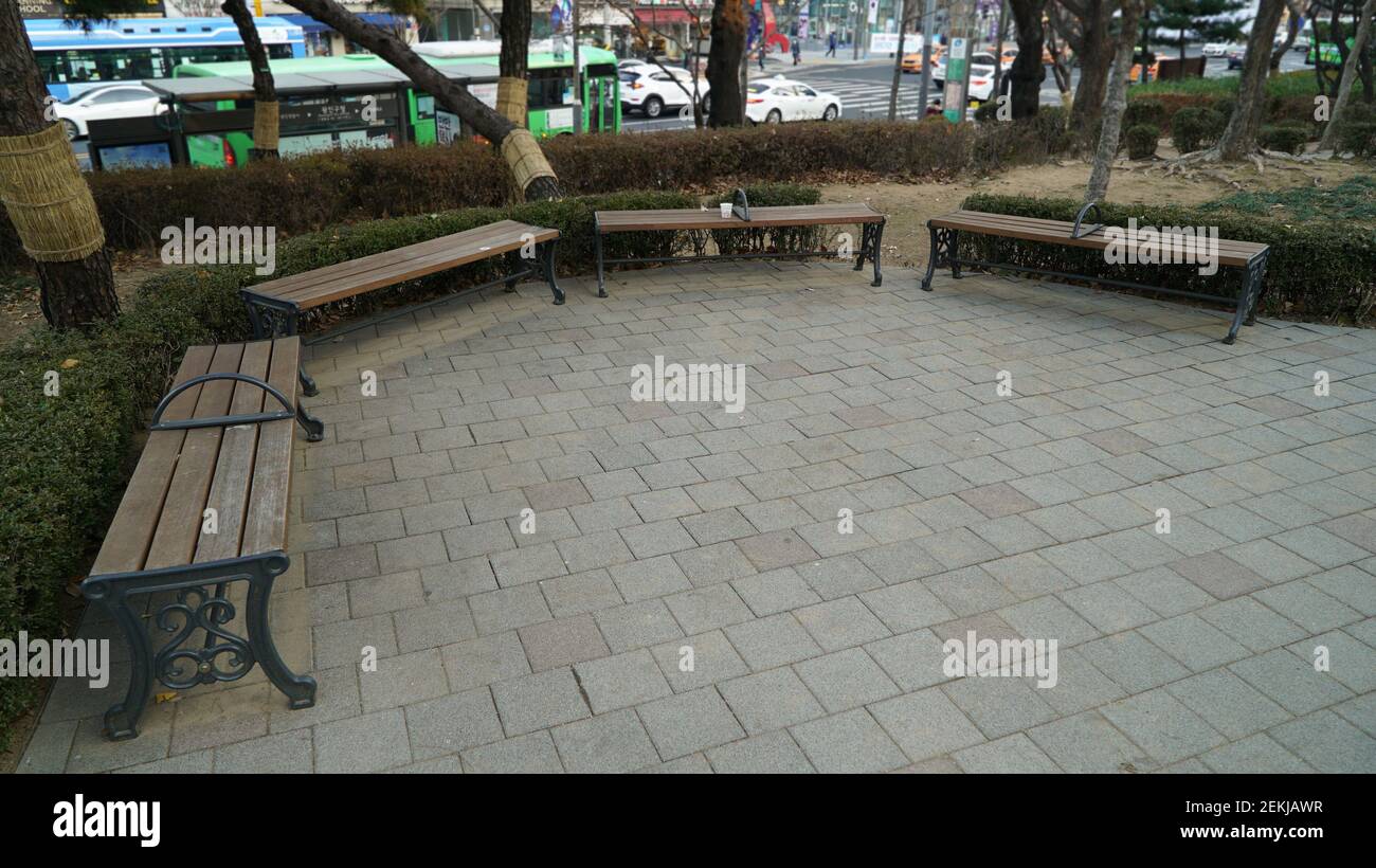 Four benches in a park in front of Gwangjin-gu Office in Seoul, Korea ...