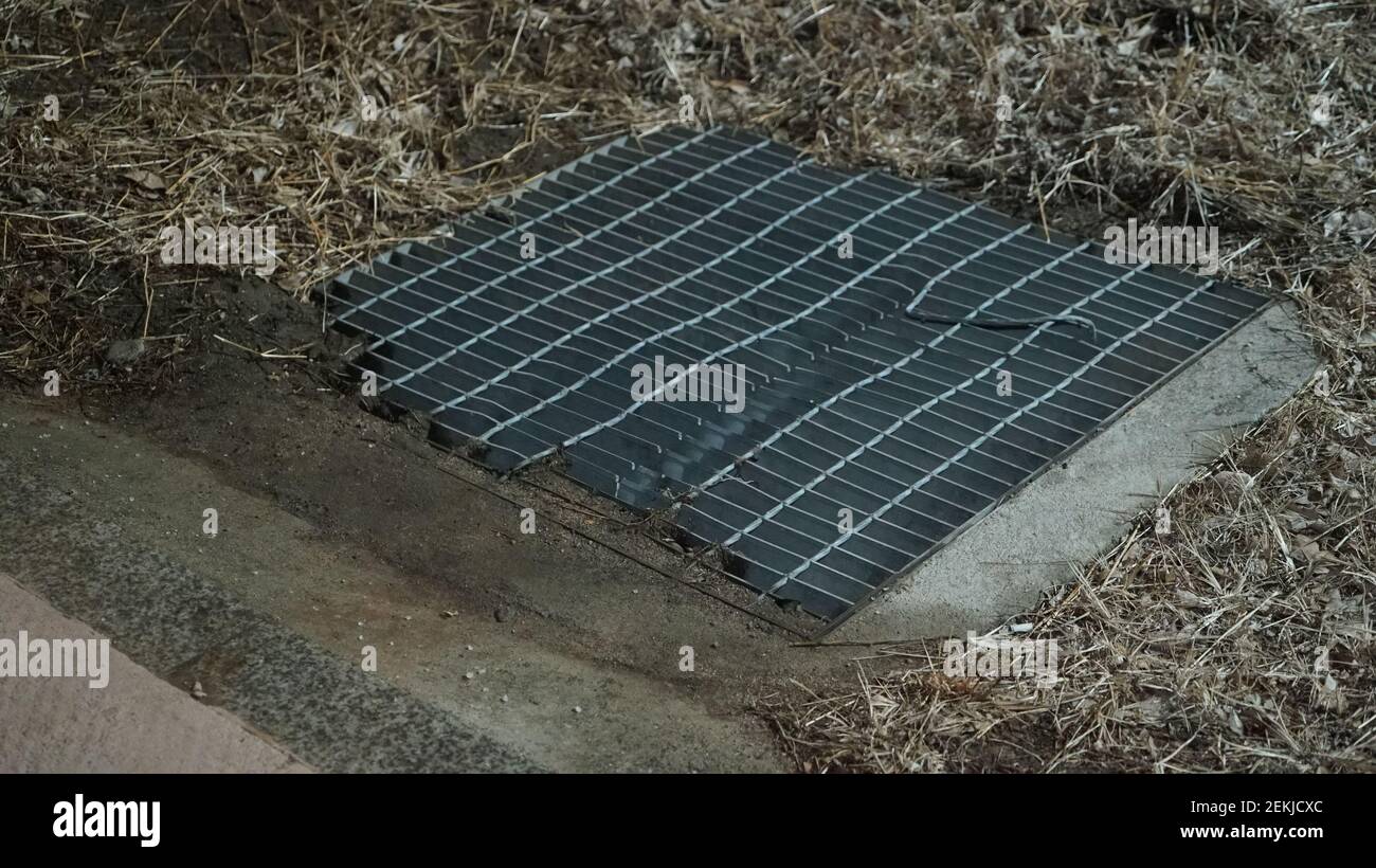 Sewer on the Night Street in south korea Stock Photo - Alamy