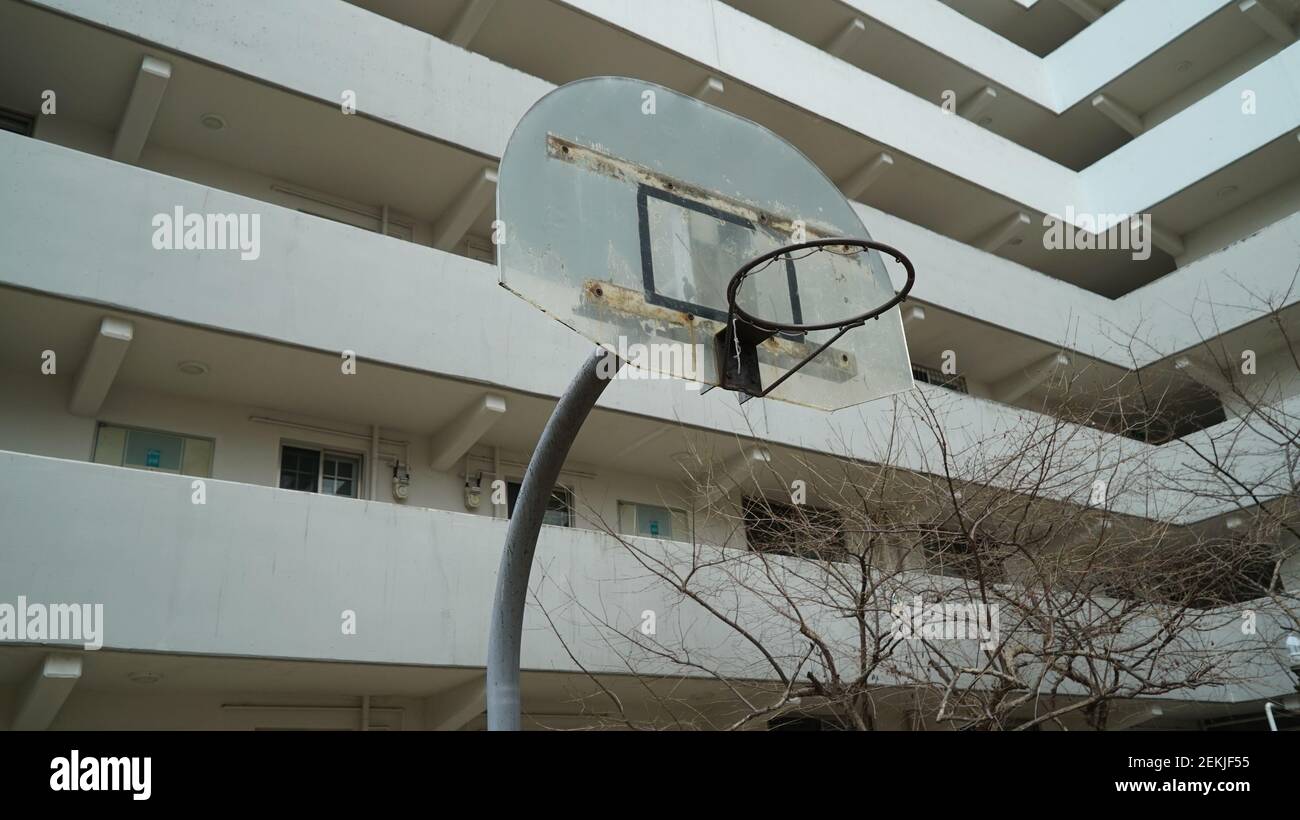 Rusty and Old Basketball Hoop in an Apartment Complex Stock Photo - Alamy