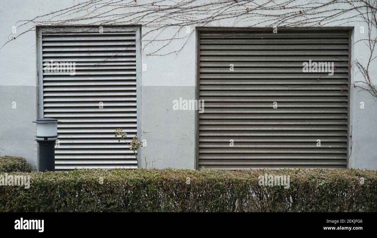 Old Rectangular Shape Ventilation Structure with Vine and Small Trees ...