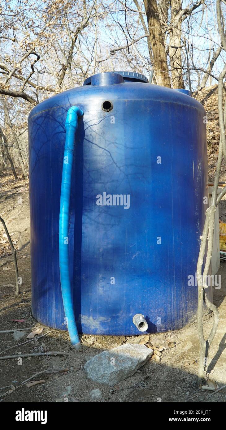 Blue water tank hi-res stock photography and images - Alamy