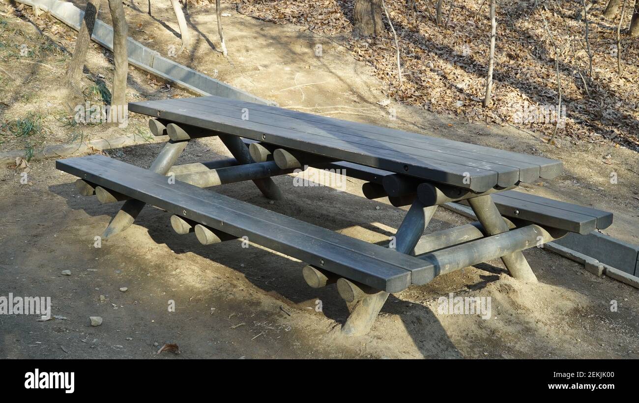 Table with Integrated Wooden Chairs in the Promenade Rest Area Stock ...