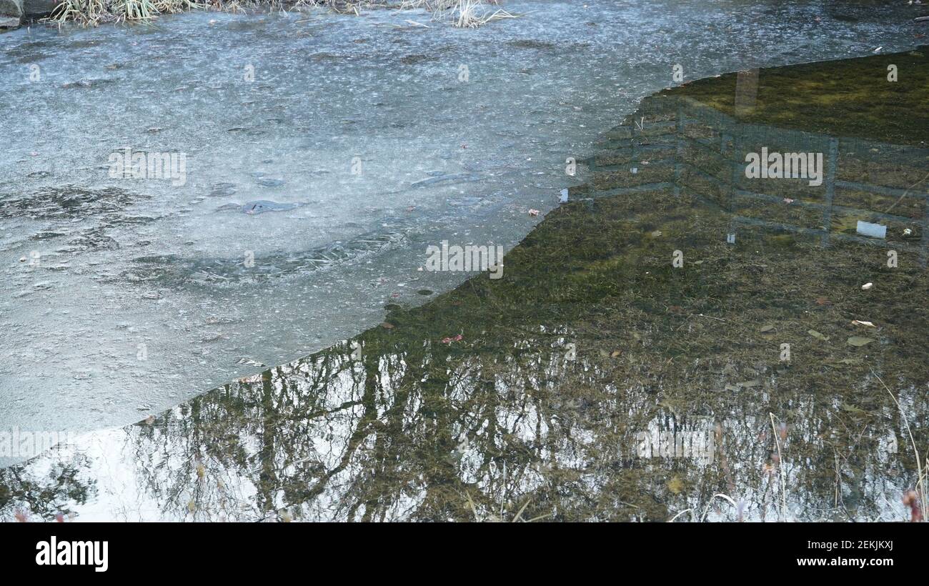 Half Frozen Surface of Winter River Stock Photo - Alamy