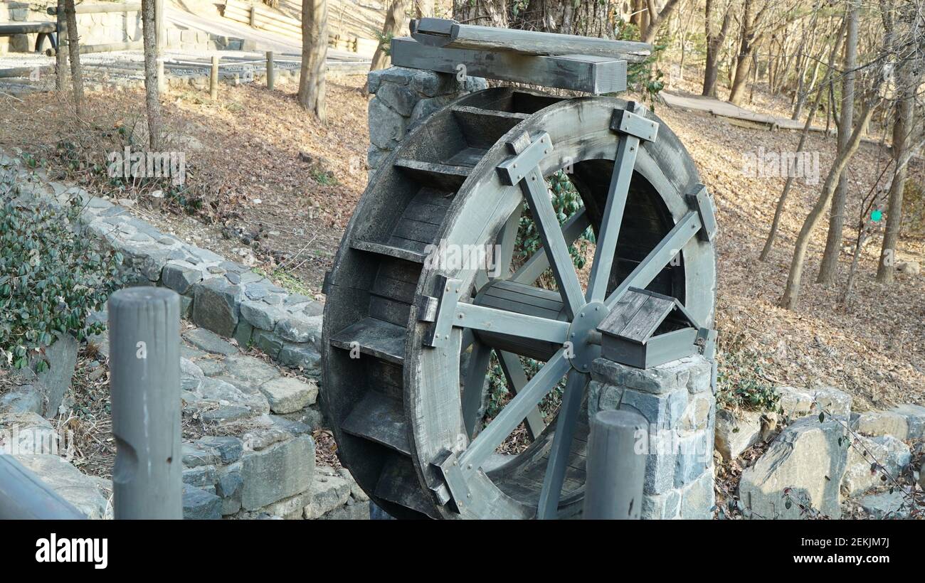 Wooden Waterwheel on Public Walkway Stock Photo - Alamy