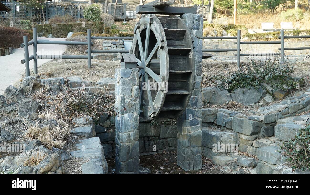 Wooden Waterwheel on Public Walkway Stock Photo - Alamy