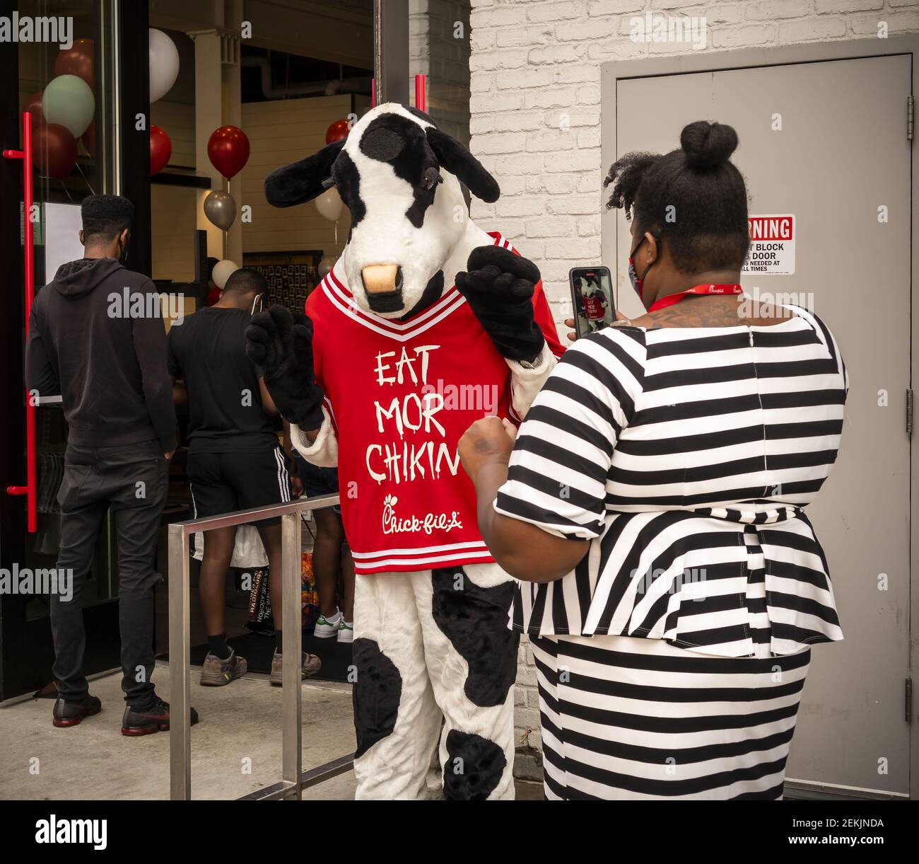 Chick-Fil-A fast food restaurant celebrates the opening of a new store ...