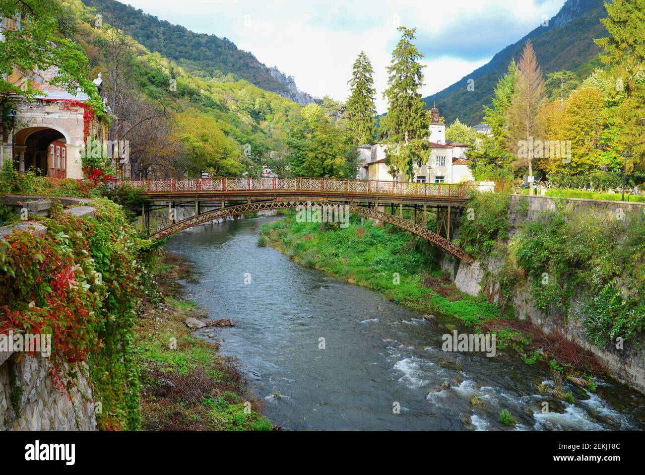 Baile Herculane Old thermal bath building metal bridge over the Cerna ...