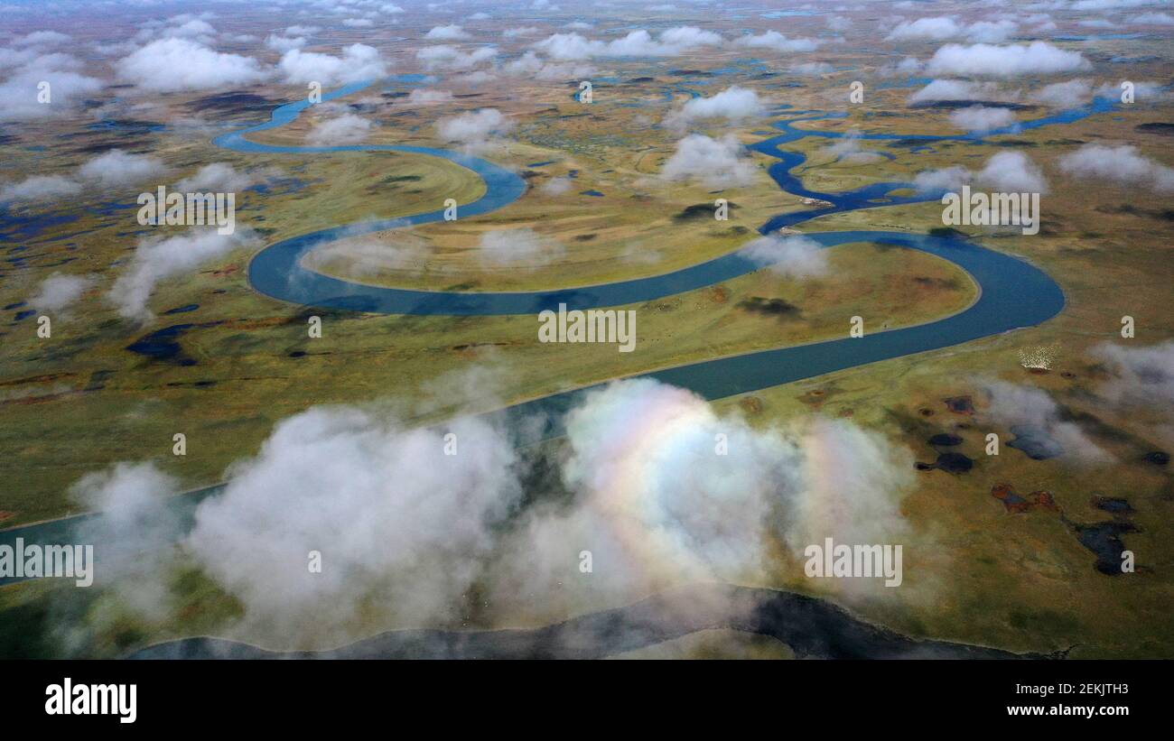 The beautiful advection fog above the Bayanbulak Grassland in ...