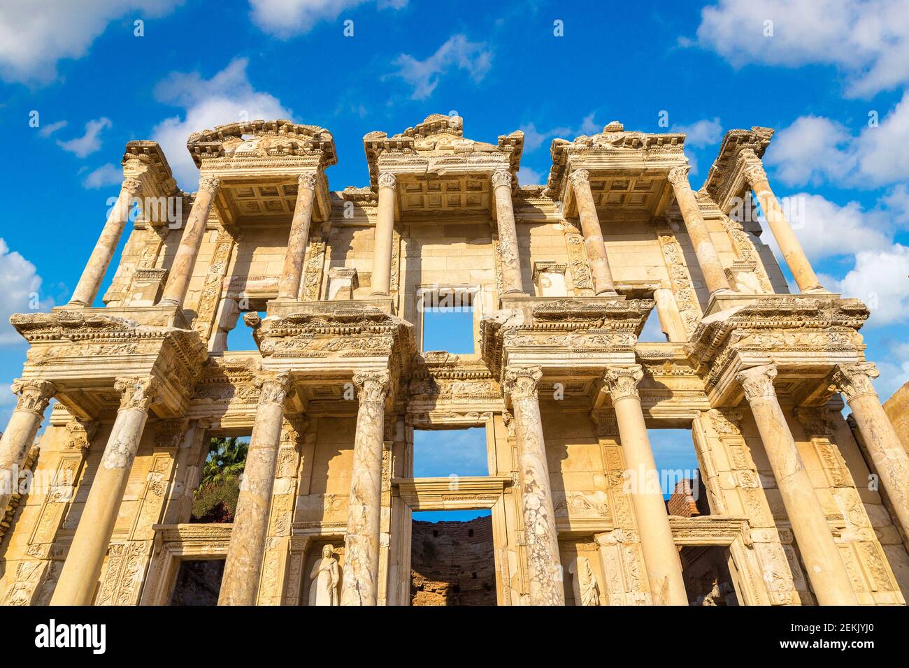 Ruins of Celsius Library in ancient city Ephesus, Turkey in a beautiful ...