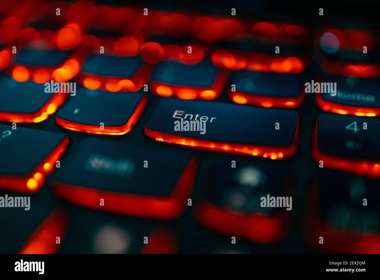 Old laptop with red highlighted keyboard with focus on Enter key Stock ...