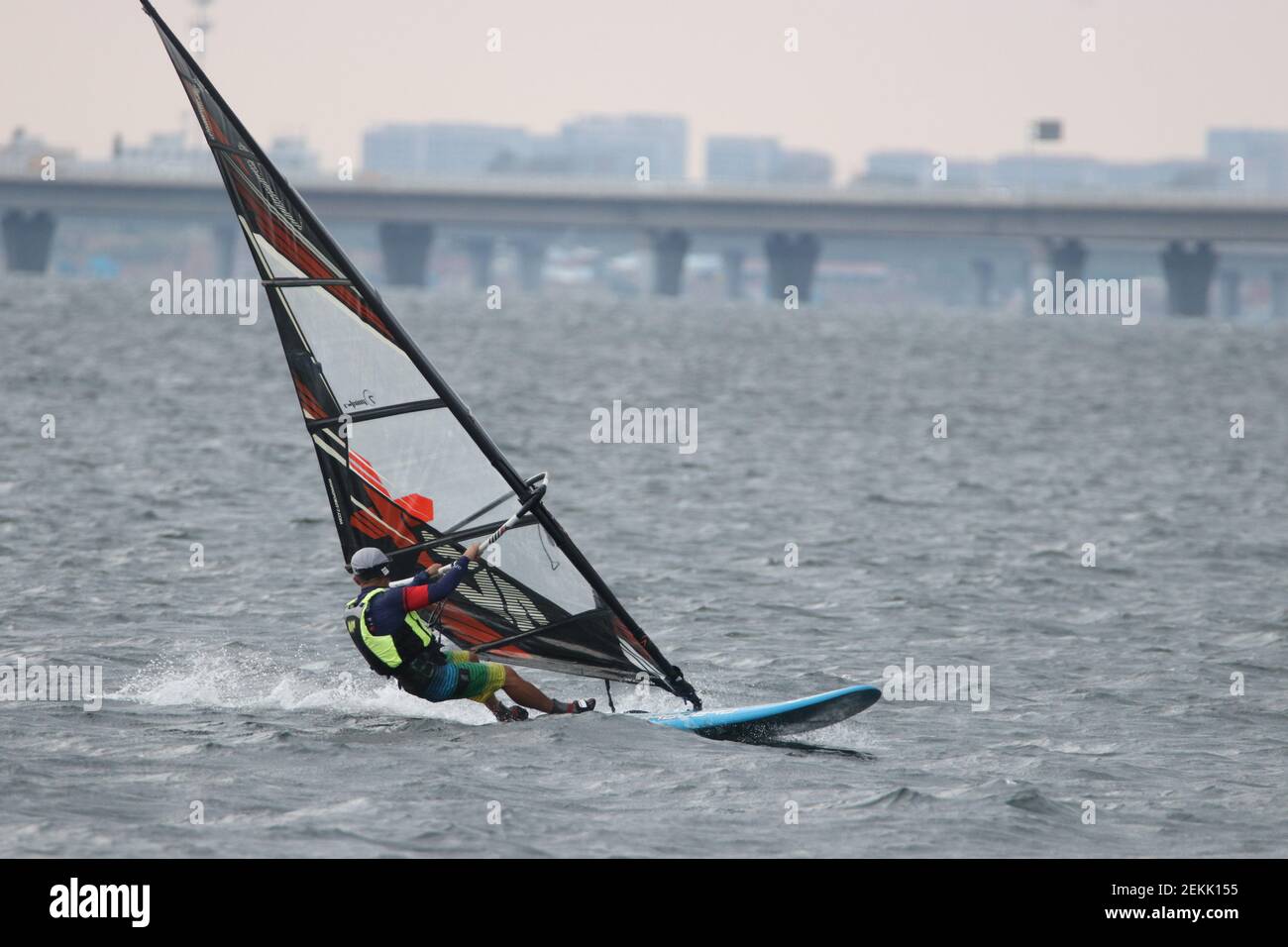 QINGDAO, CHINA - SEPTEMBER 15, 2020 - People play windsurfing in ...