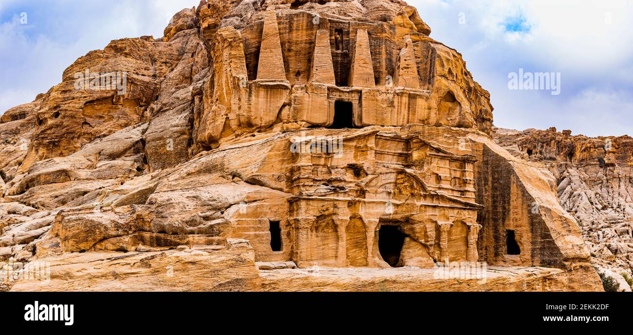 Obelisk Tomb carved in sandstone cliffs of Petra, Jordan Stock Photo ...