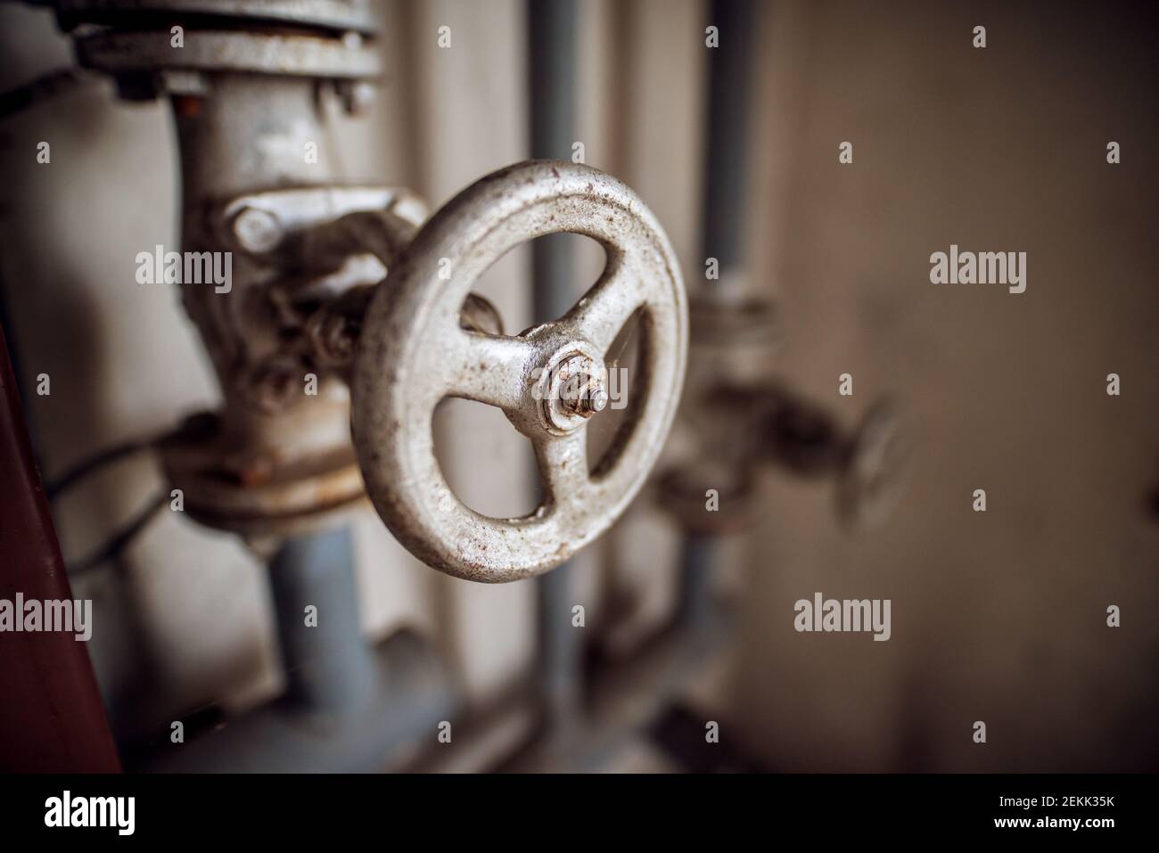Close up focus view of industrial valve wheel and stem Stock Photo - Alamy