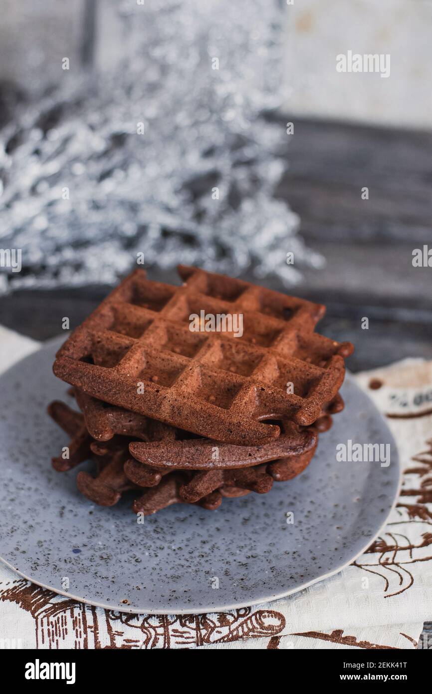 Traditional Belgian waffles with cocoa on wooden background, homemade ...