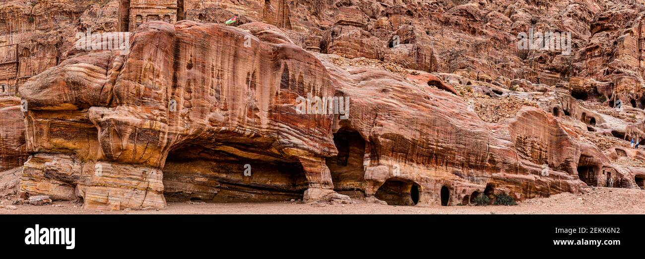 Rock formations with cliff dwellings, Petra, Jordan Stock Photo - Alamy
