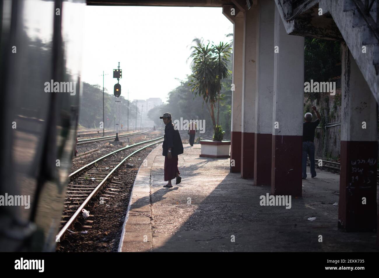 YANGON, MYANMAR - DECEMEBER 31 2019: A local Burmese man in longyi ...
