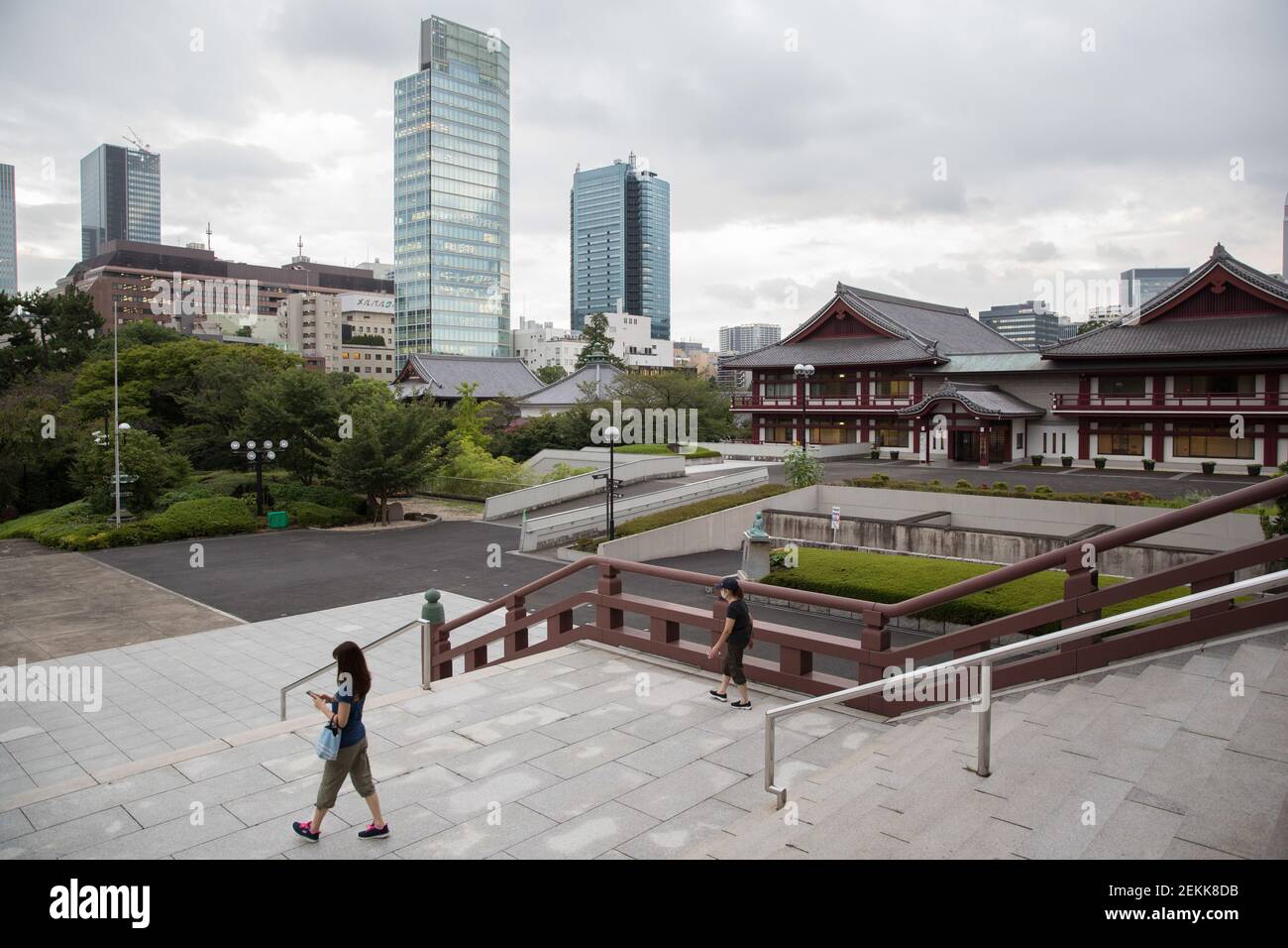 Visitors leaving the main Hall of Zojoji Temple in Shibakoen, Minato-Ku ...