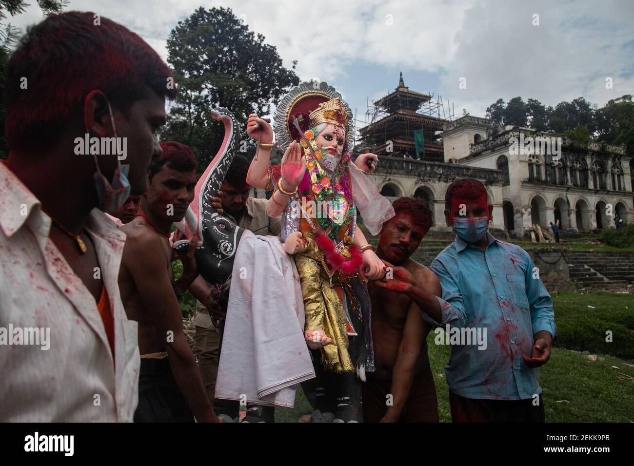 Devotees carrying an idol of Lord Vishwakarma during the celebration ...