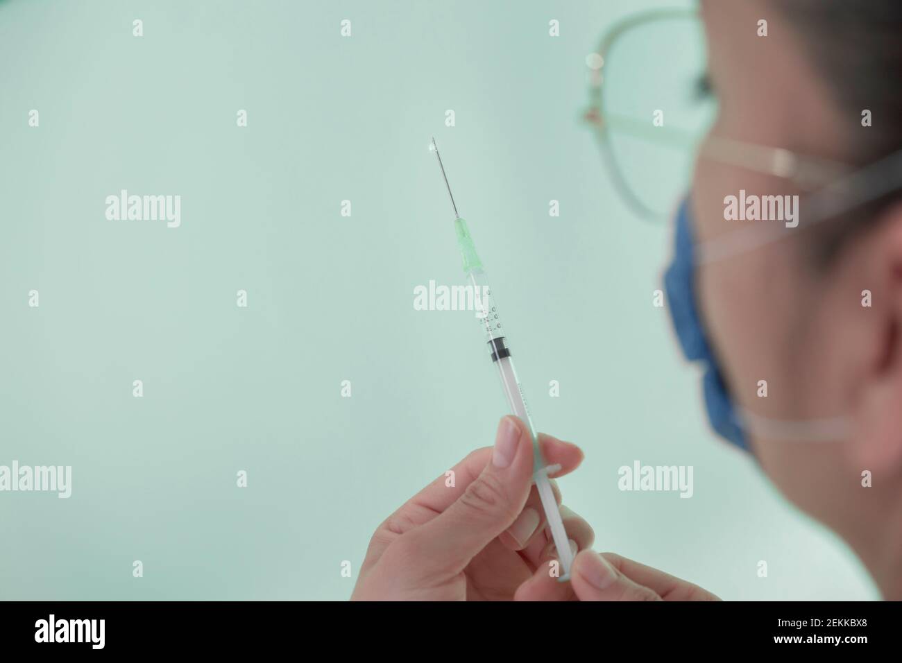 Woman preparing insulin injection hi-res stock photography and images ...