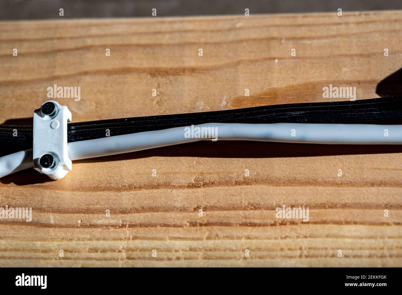 cable wire staple used to organize wires in a residential building ...