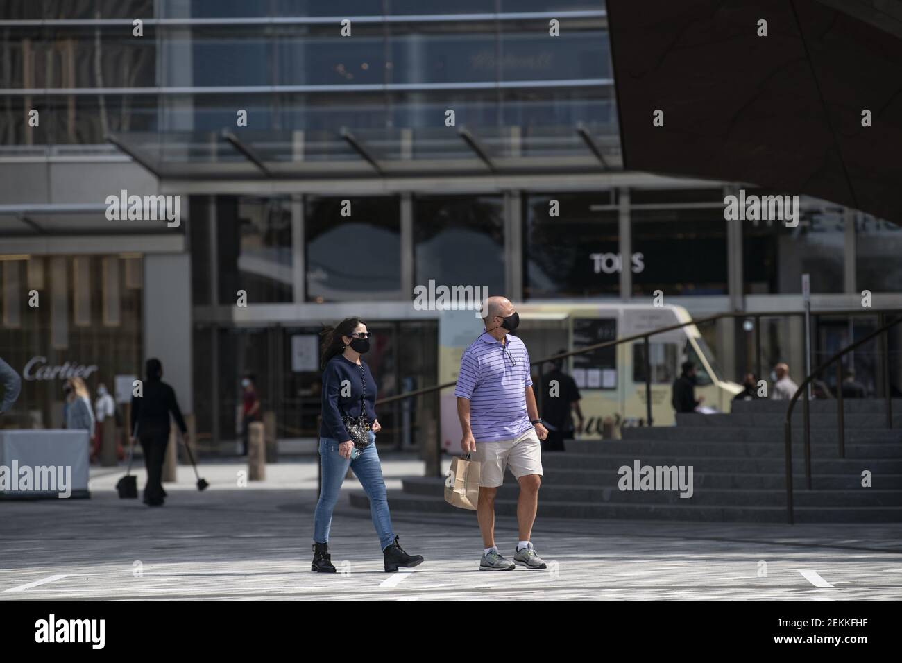 September 18, 2020: Shoppers wearing PPE masks walk past The Vessel at ...