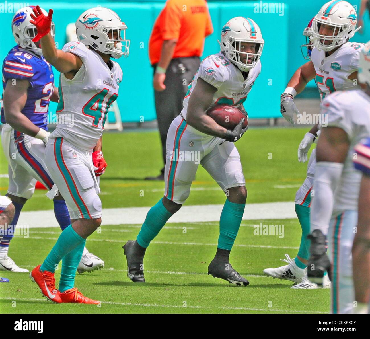 Miami Dolphins cornerback Noah Igbinoghene (23) recovers a Buffalo Bills fumble late in the ...