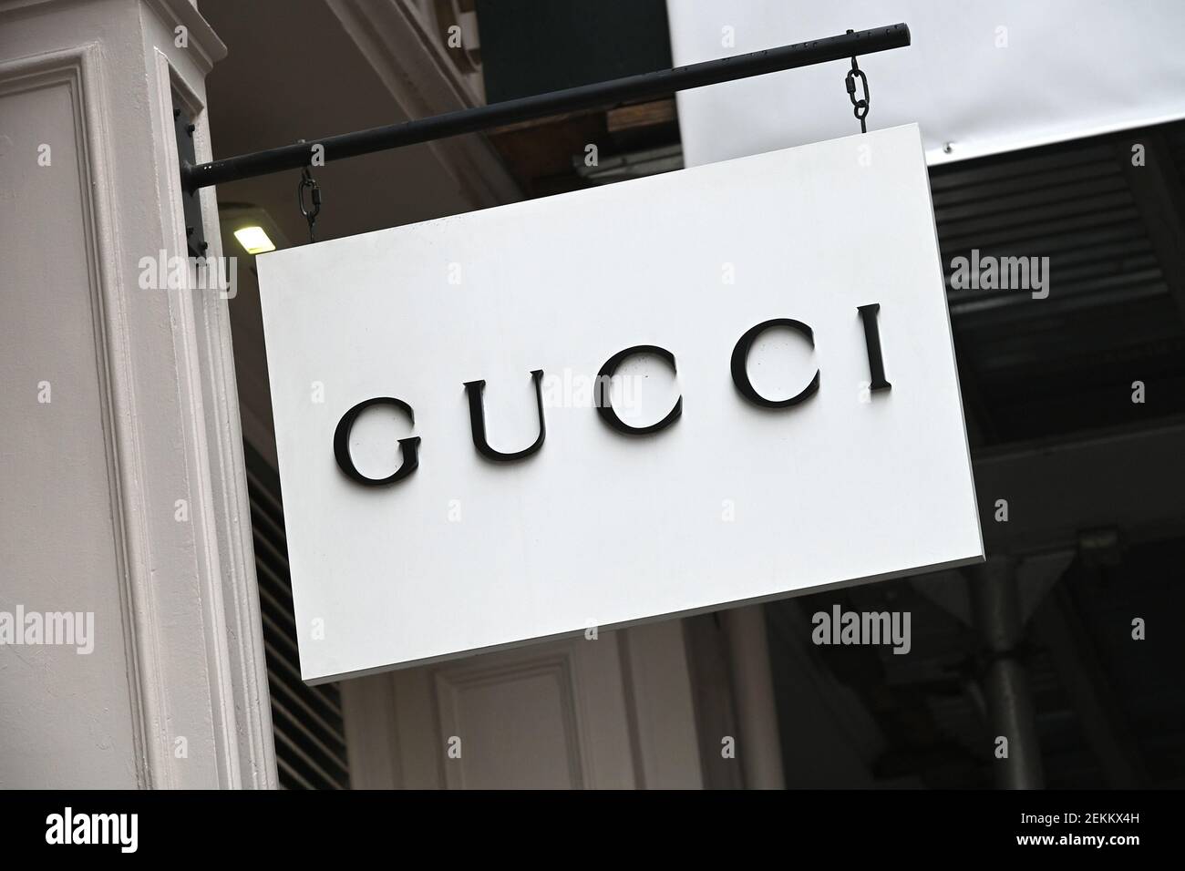 Italian luxury fashion brand Gucci banner hangs outside its retail ...