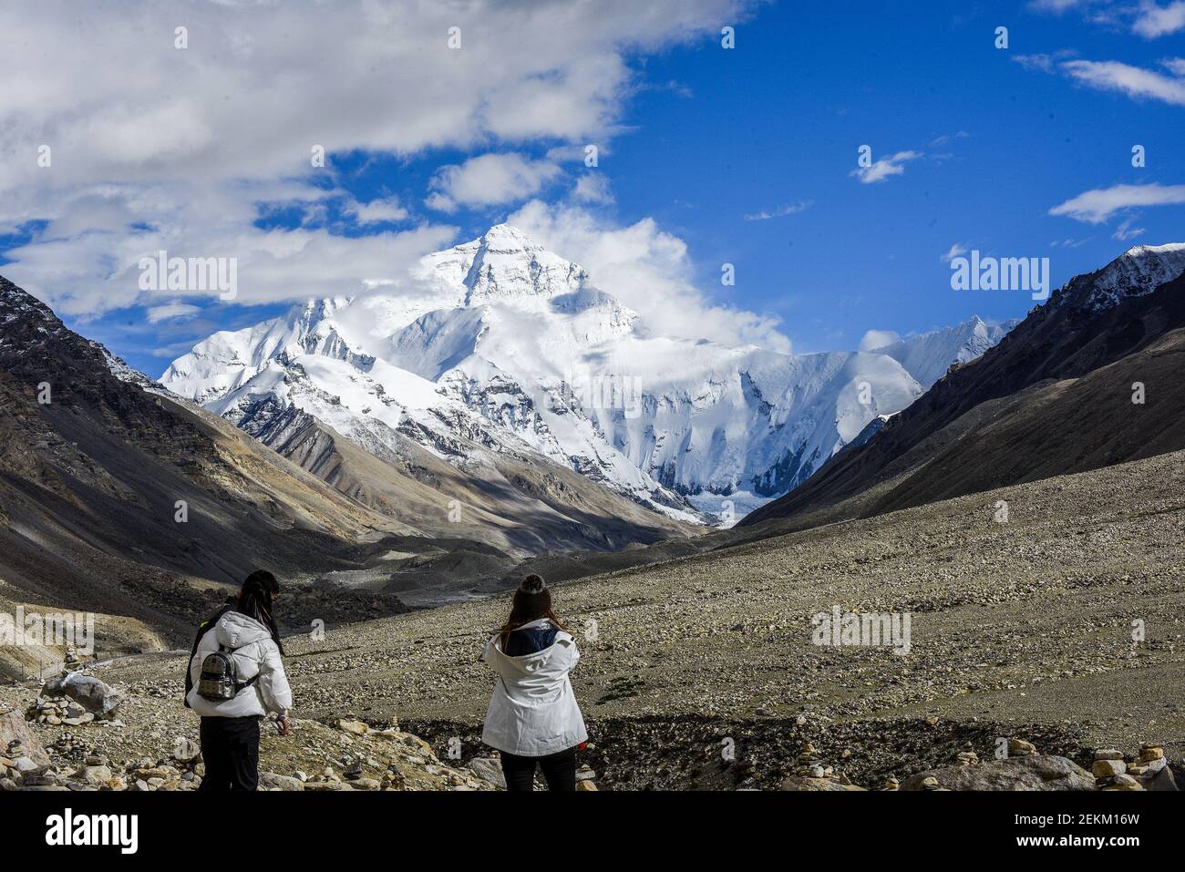DINGRI, CHINA - AUGUST 26, 2020 - Tourists at the foot of Mount Everest ...