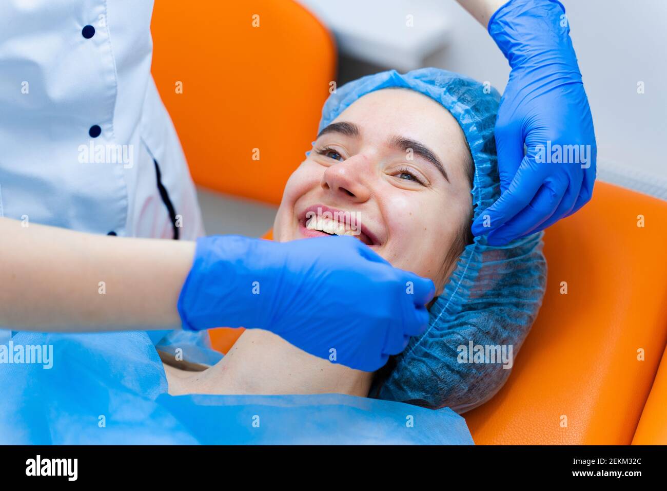 Spa procedure. Facial massage and spreading cream. Cosmetic skin care ...