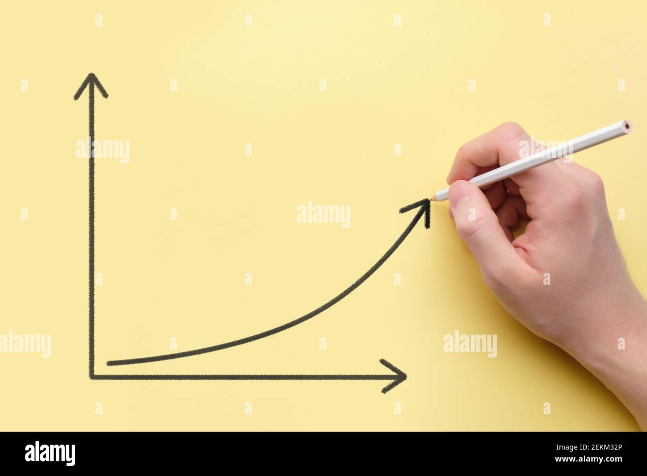 Person draws a graph of growth with a pencil. Success concept Stock ...