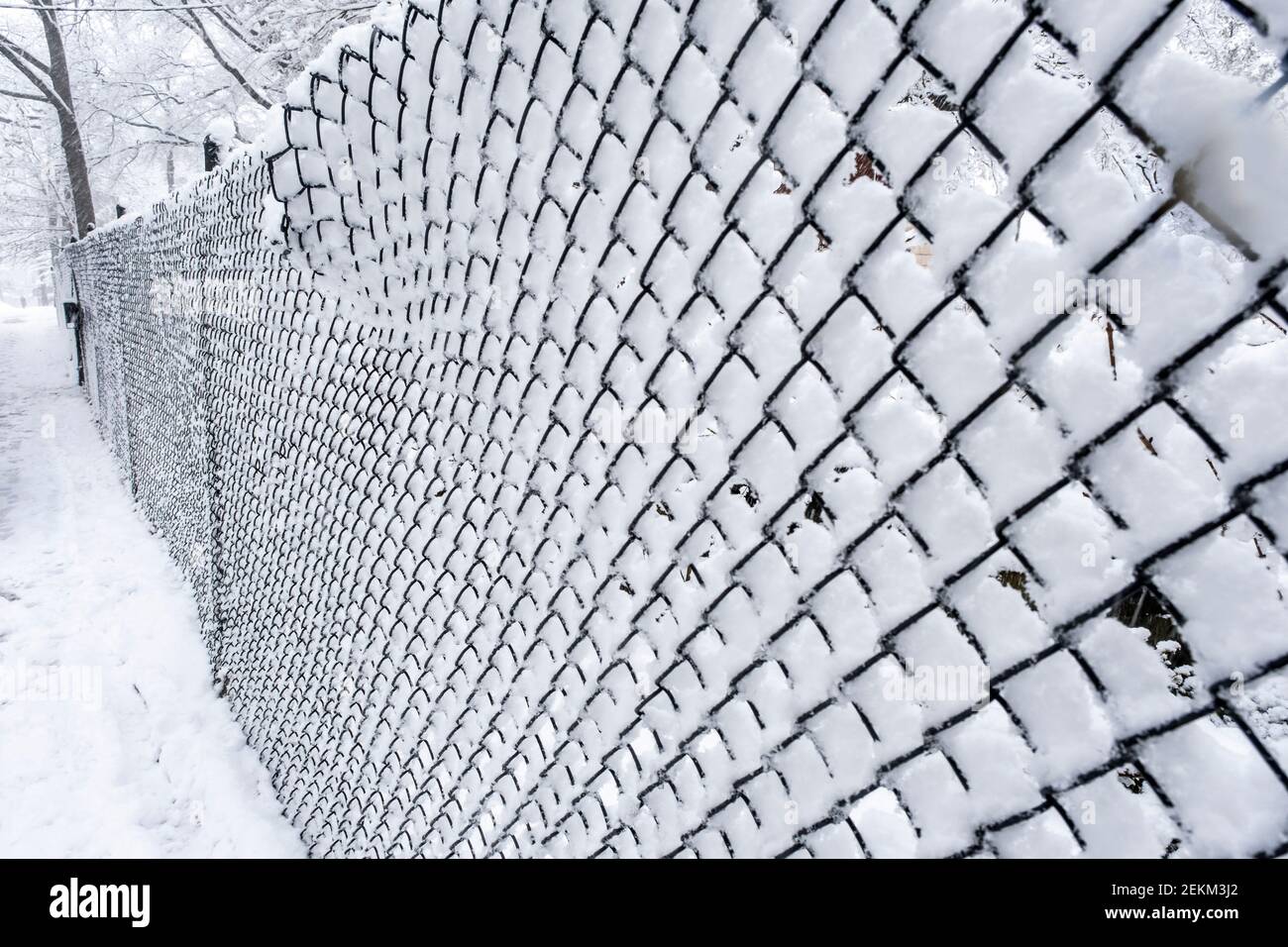 A fence with snow Stock Photo - Alamy