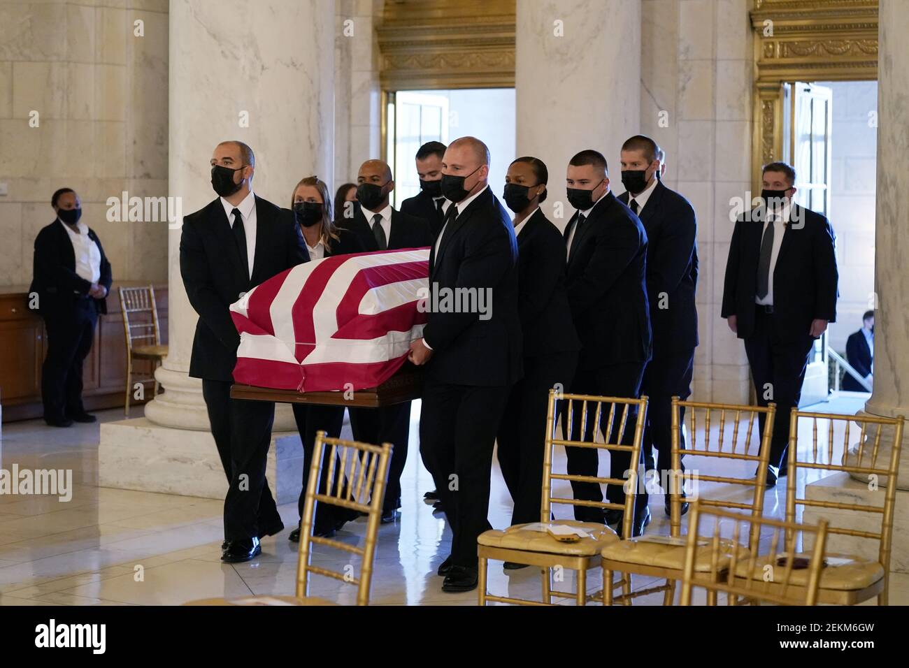 The flag-draped casket of Justice Ruth Bader Ginsburg, carried by ...