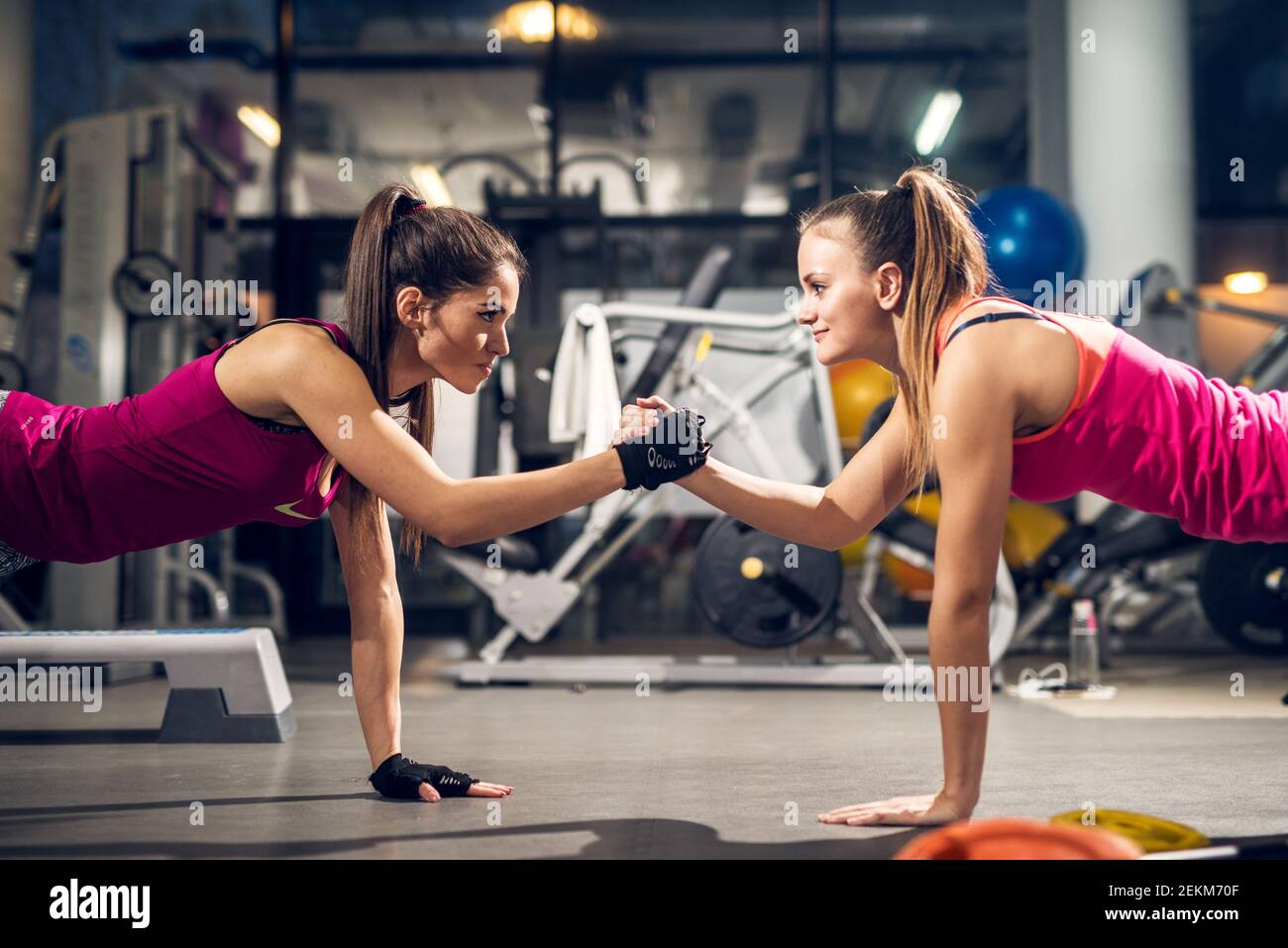 Two young motivated aggressive attractive focused sporty active girls ...