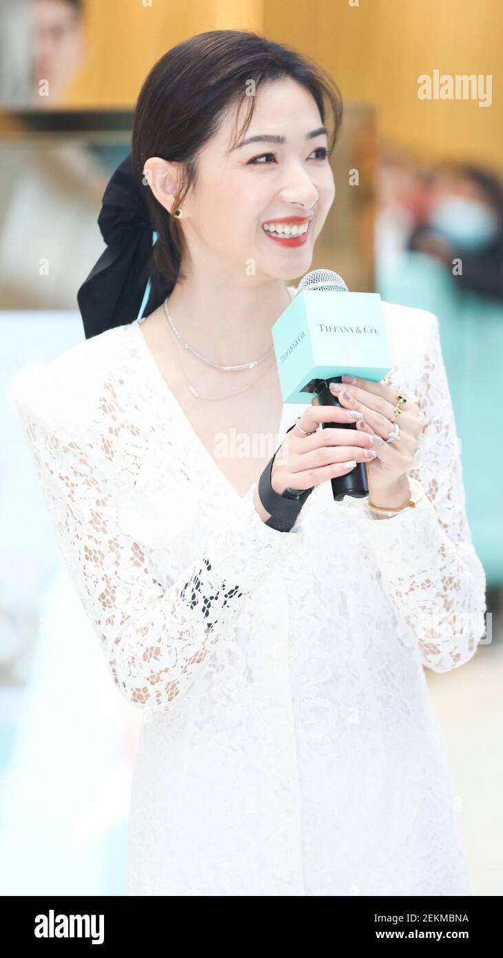 Chinese actress and singer Wan Qian shows up in white dress, showing ...