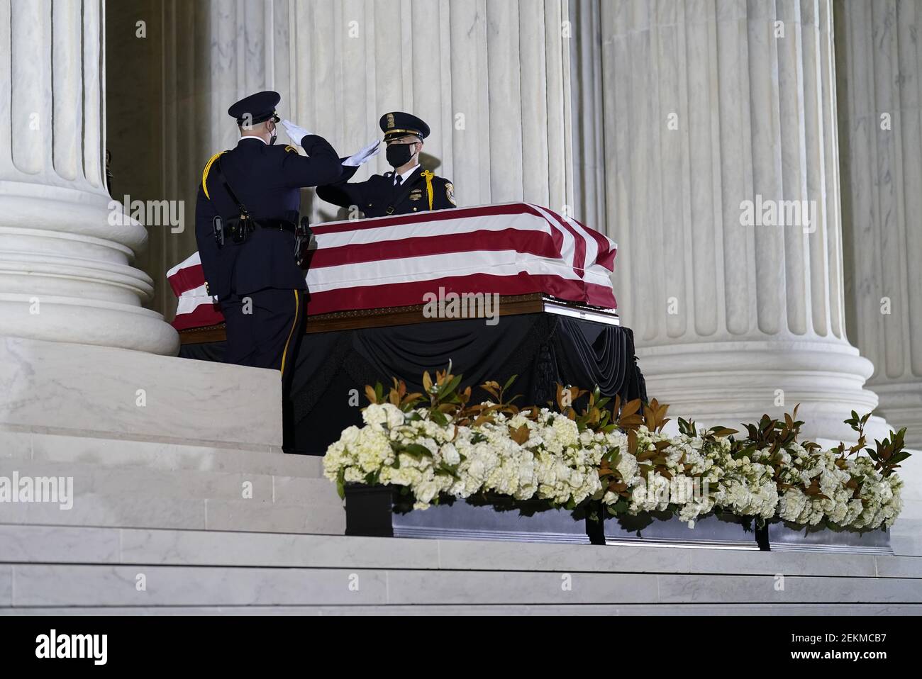 A Supreme Court Honor Guard moves the flag-draped casket of Justice ...