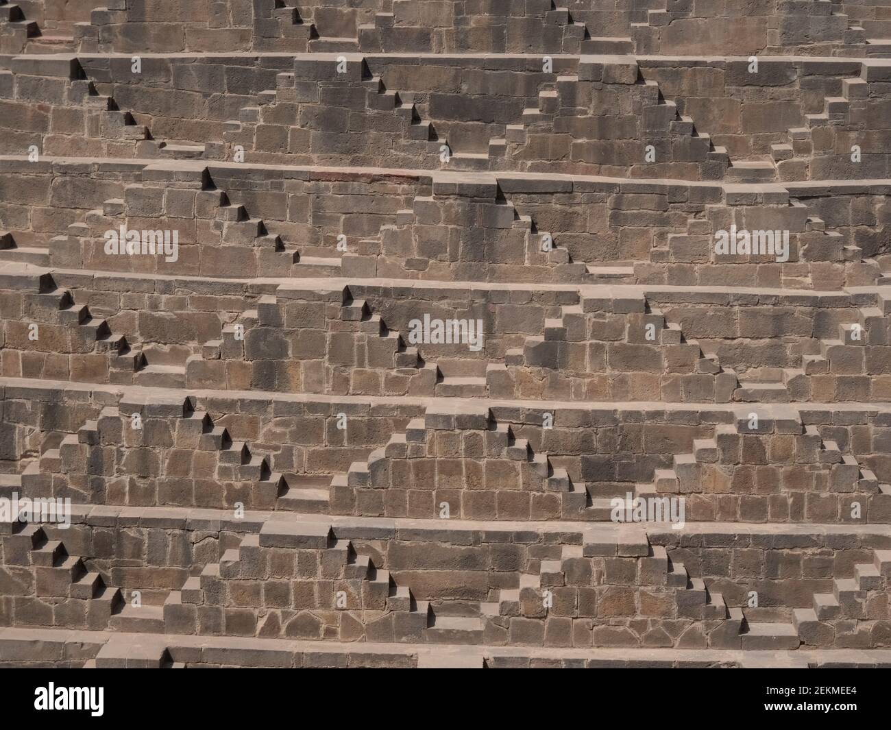 close up of steps at chand baori, a stepwell situated in the village of ...
