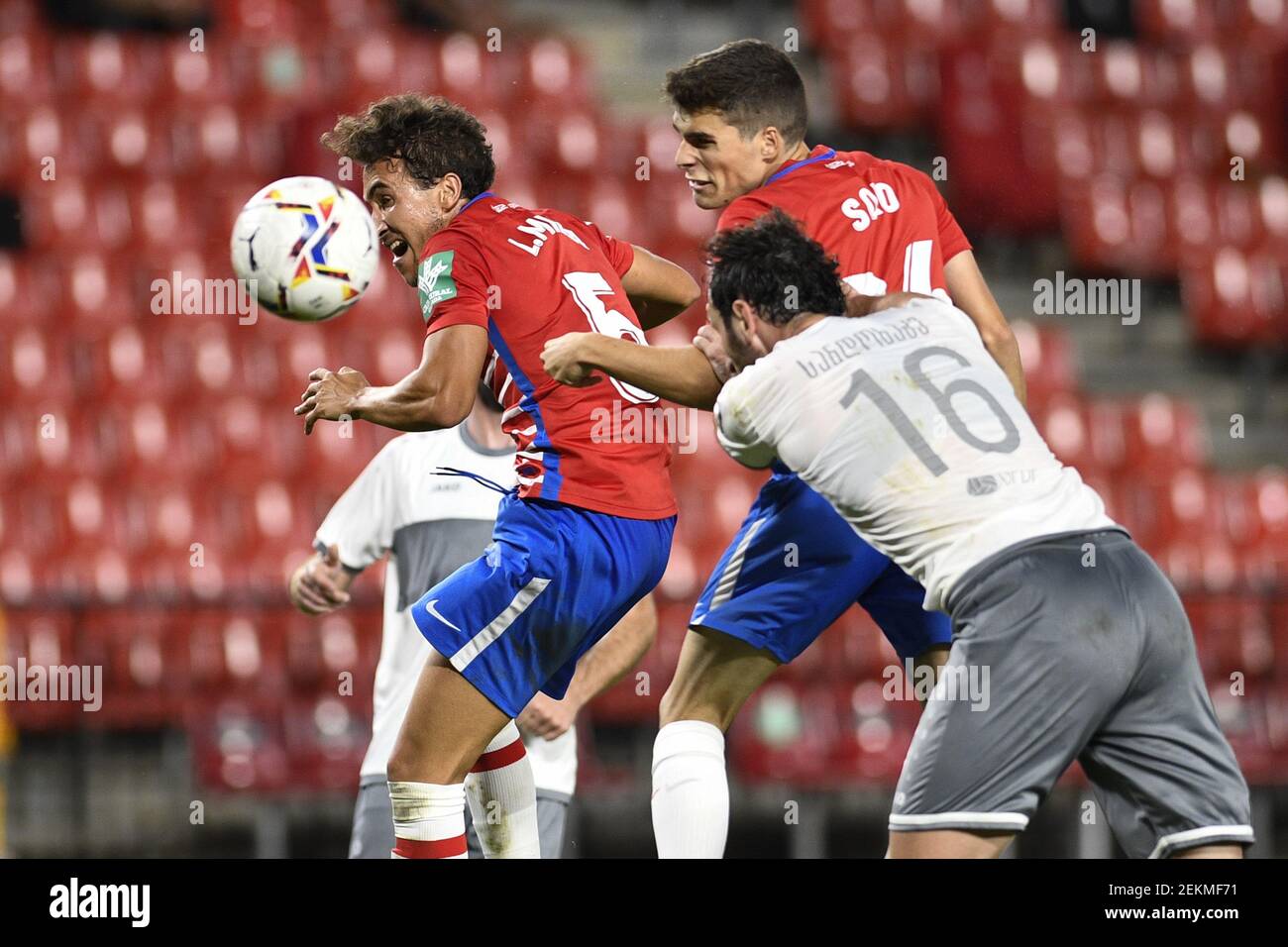 Granada CF players Luis Milla and Alberto Soro are seen in action ...