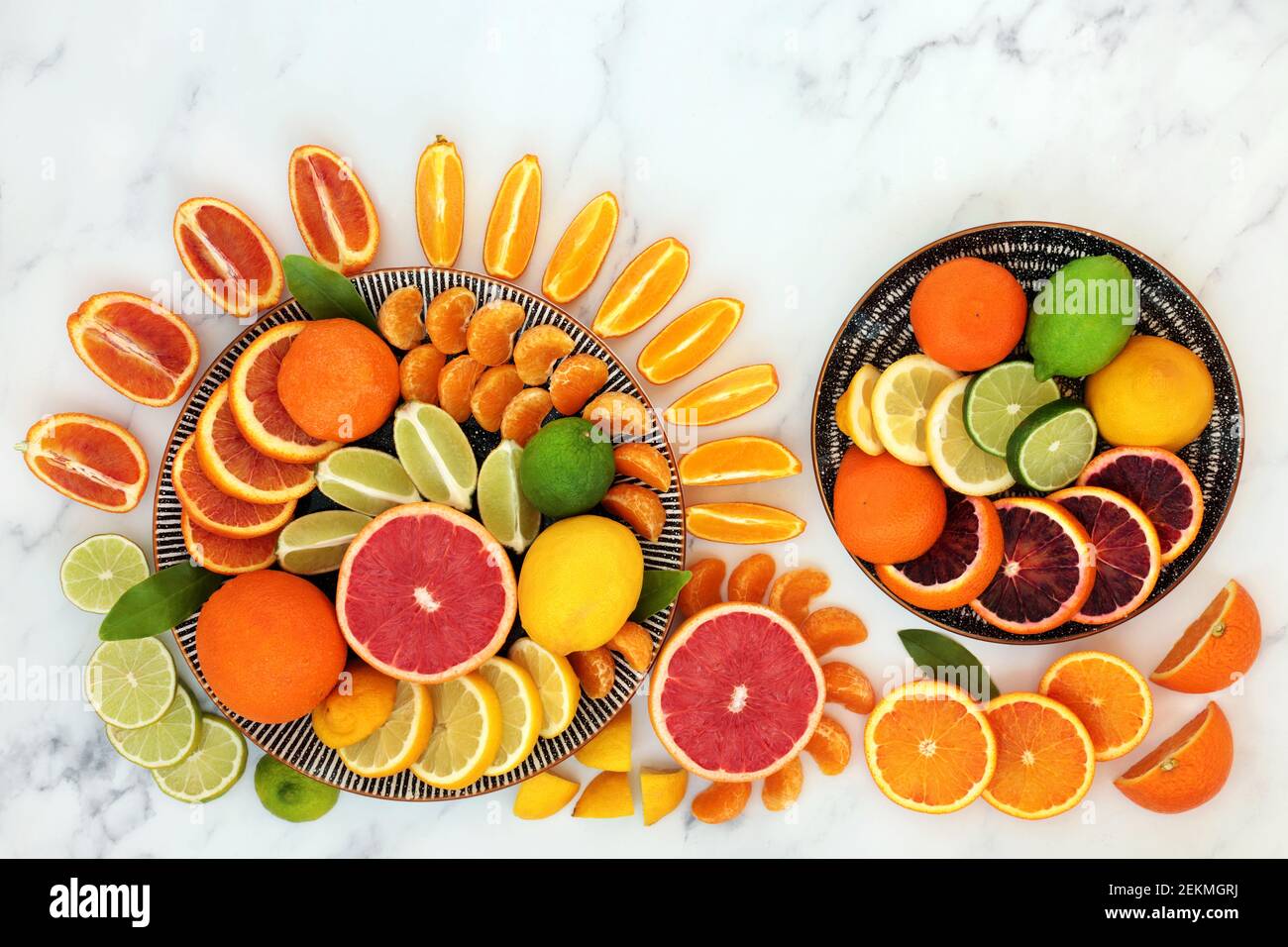 Delicious fresh citrus fruit on plates & loose high in antioxidants ...