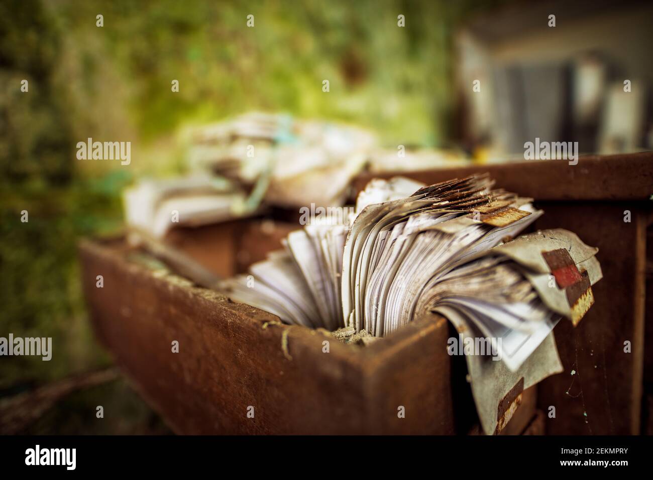Close up focus view of ruined old forgotten wood drawer box full of ...