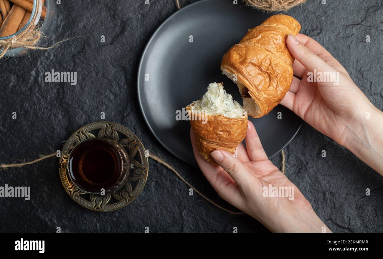 Woman croissant hi-res stock photography and images - Alamy
