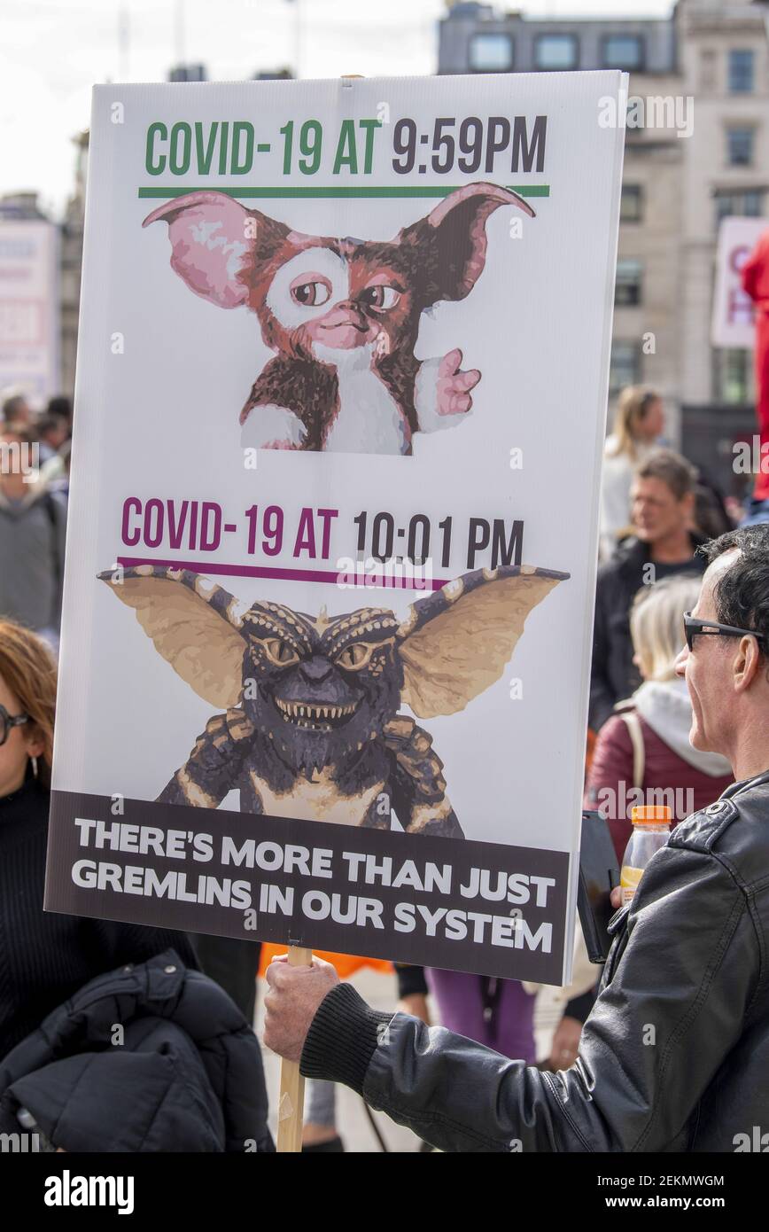 Protester holding a placard with Gremlins on during the ‘We Do Not ...