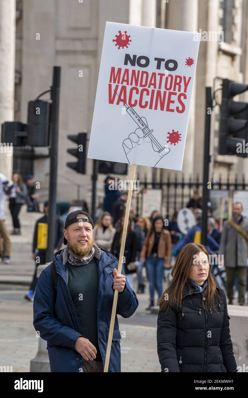 Protester holding a placard with ’No to mandatory vaccines’ during the ...