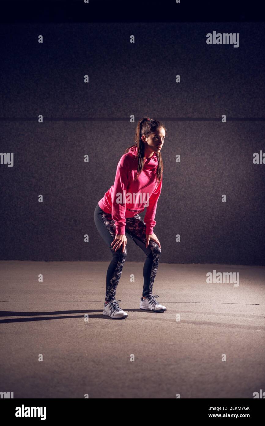 Portrait vertical view of young athletic slim fashion active girl ...